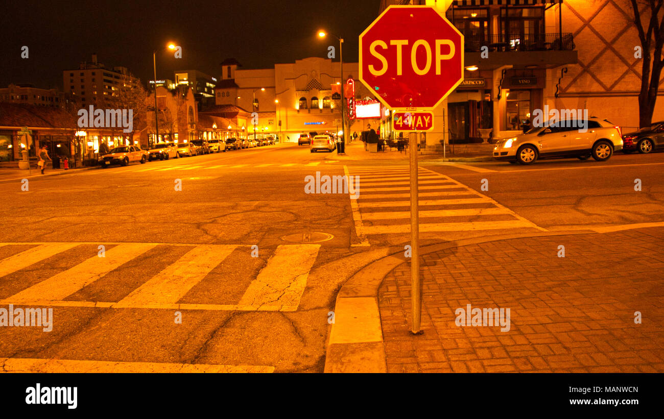 Stop sign crossroad Stock Photo - Alamy