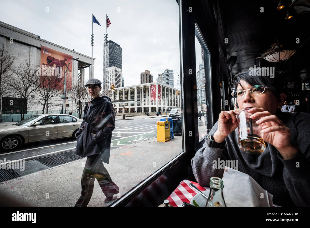 Undefined people wlaking outside of the PJ Clarkes, in front of Loncoln ...