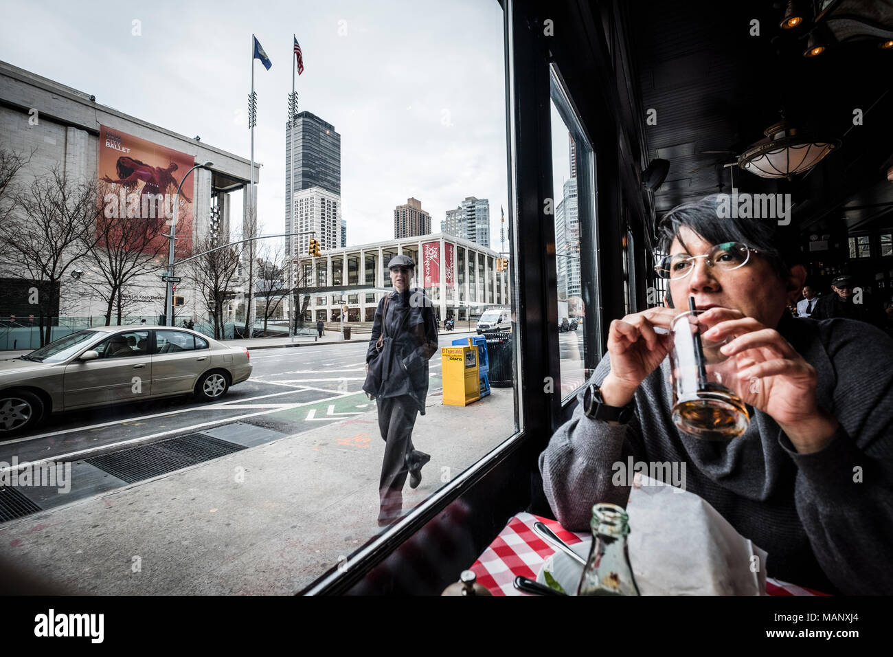 Undefined people wlaking outside of the PJ Clarkes, in front of Loncoln ...