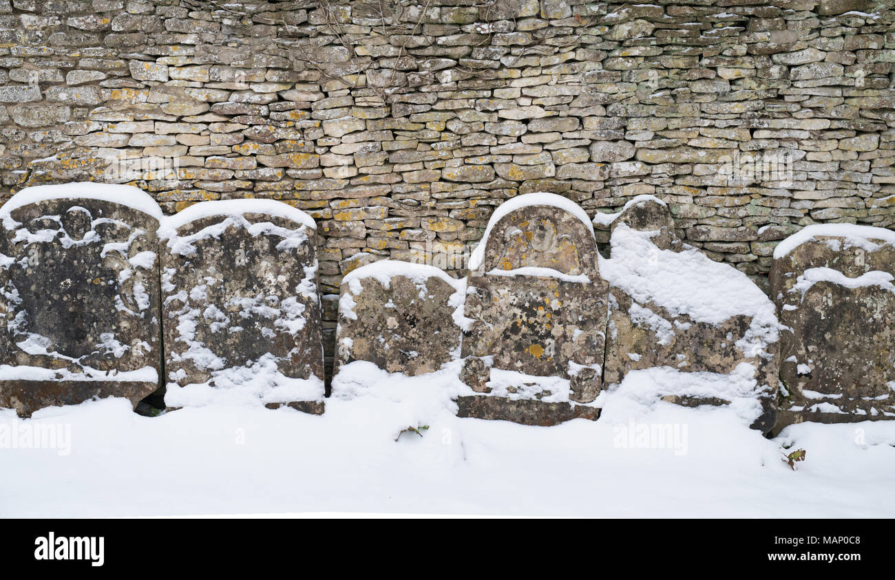 Gravestones by a dry stone wall hi-res stock photography and images - Alamy