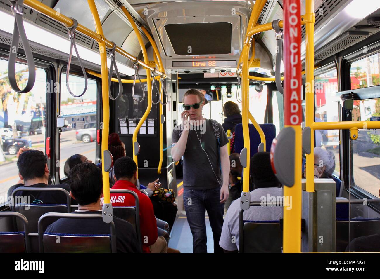 interior of public bus with passengers on line 82 houston texas USA ...