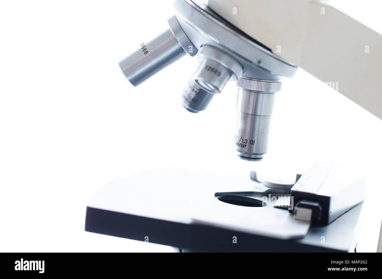 Close-up shot of microscope with metal lens at laboratory. Scientific ...