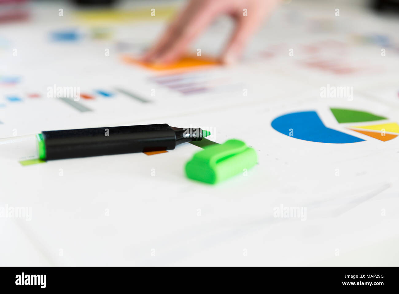 Graphs and charts. Green marker in focus. Business concept, statistics ...