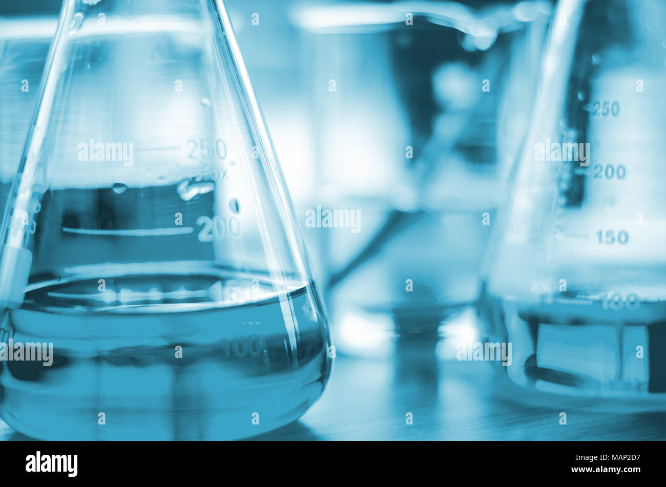 three erlenmeyer flask , Glassware on science laboratory research and ...