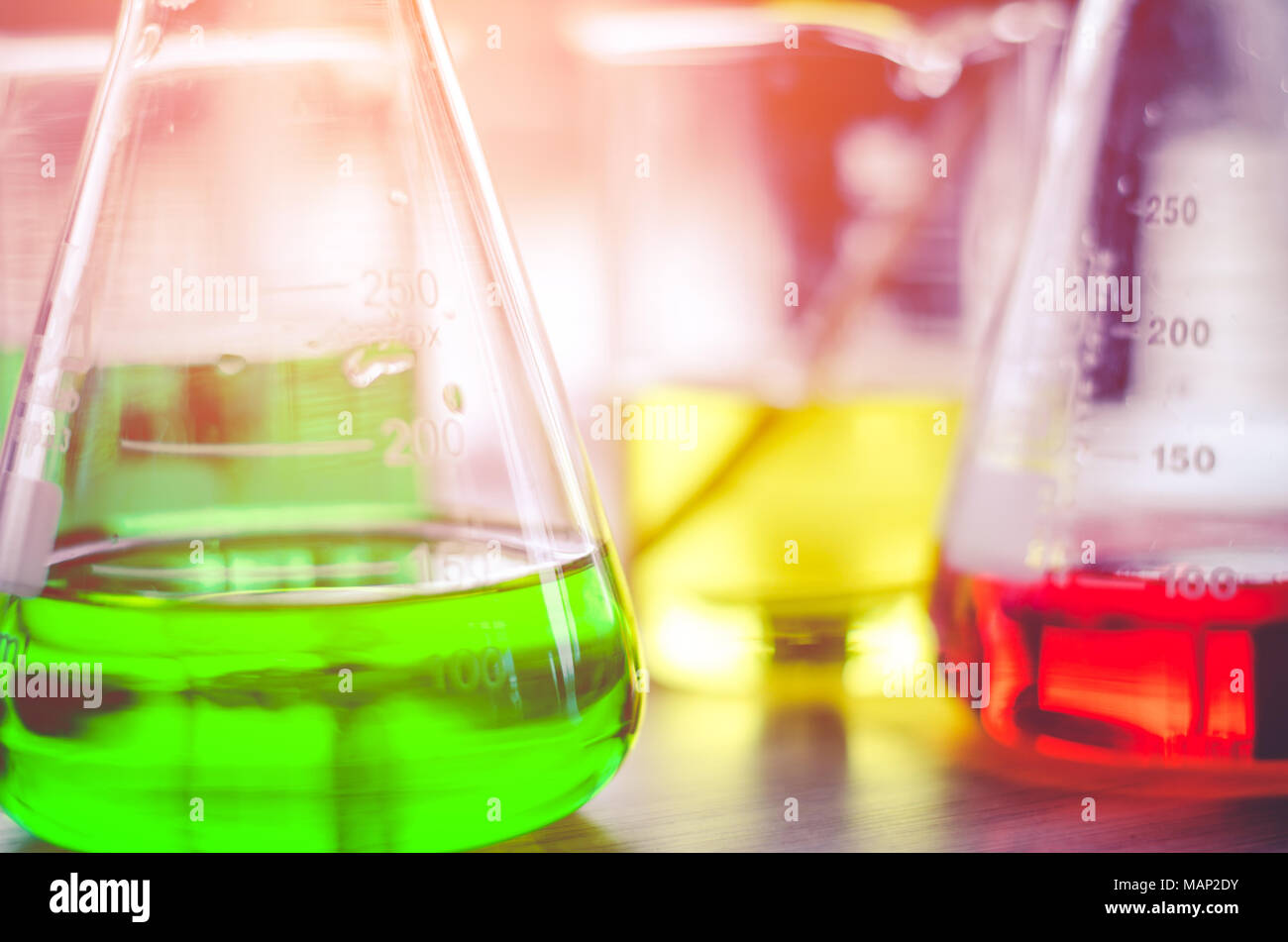 three erlenmeyer flask , Glassware on science laboratory research and ...