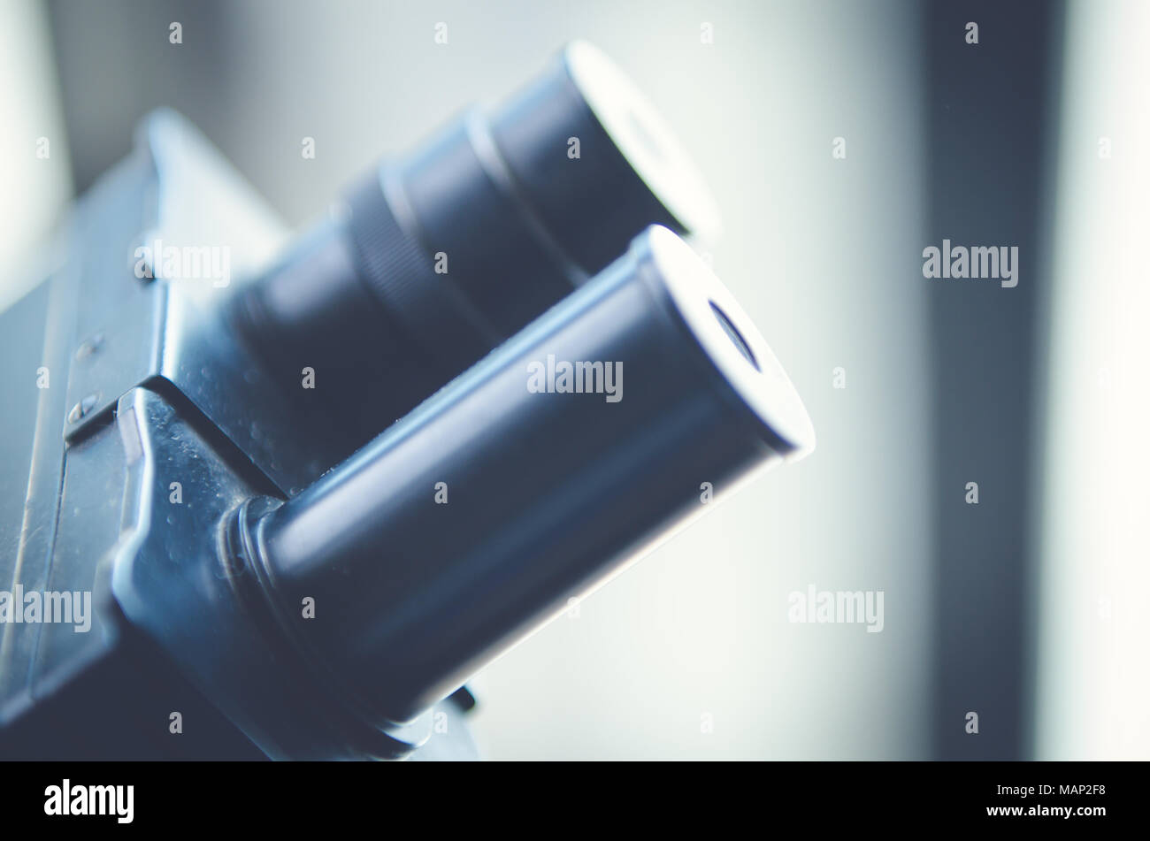 Close-up shot of microscope with metal lens at laboratory. Scientific ...