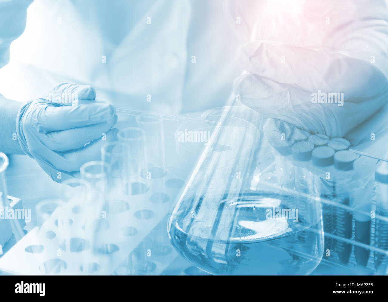 Vacutainer or test tube in lab on table Stock Photo - Alamy