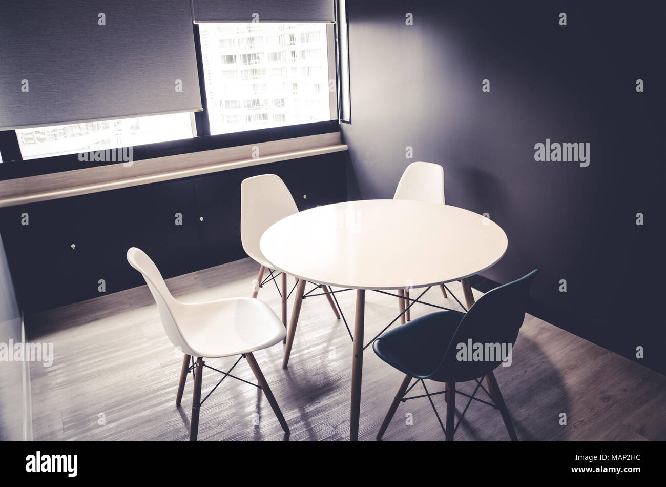 wooden table and chair in meeting room Stock Photo - Alamy