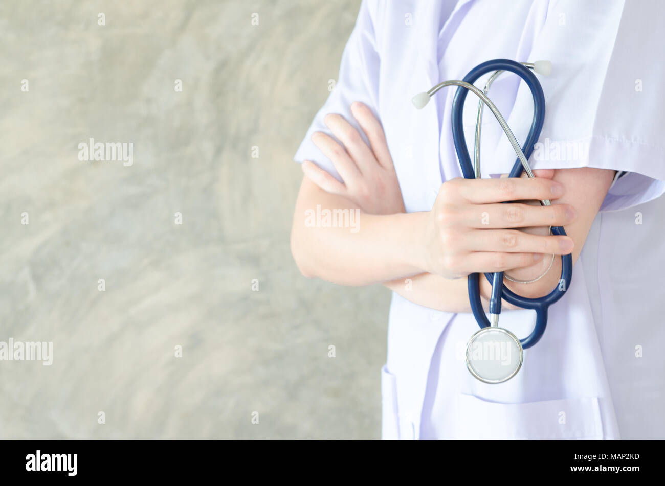 doctor posing in the office, She is wearing a stethoscope, medical ...