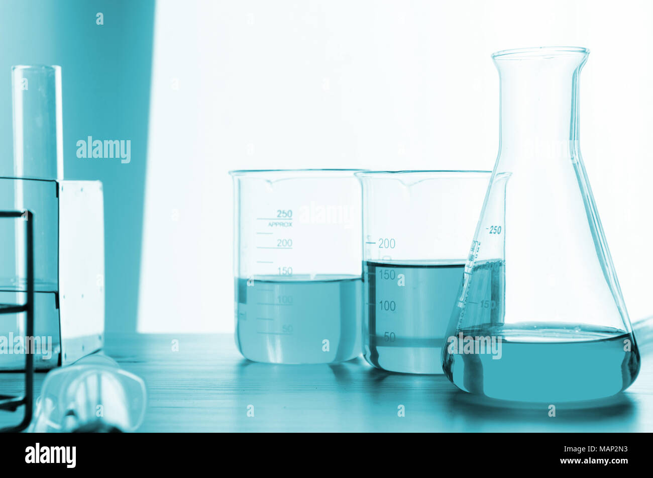 three erlenmeyer flask , Glassware on science laboratory research and ...