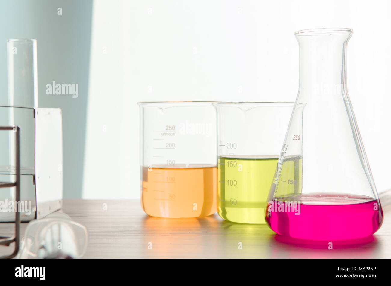 three erlenmeyer flask , Glassware on science laboratory research and ...