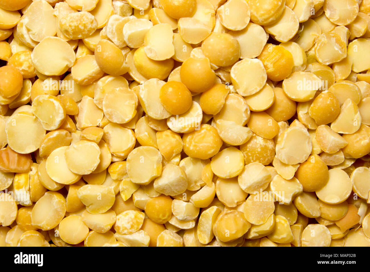 Dry split peas as a background Stock Photo - Alamy