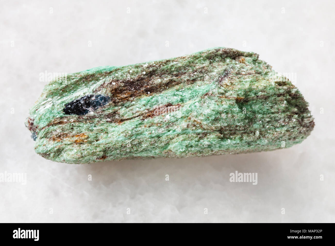 macro shooting of natural mineral rock specimen - raw Paragonite stone ...