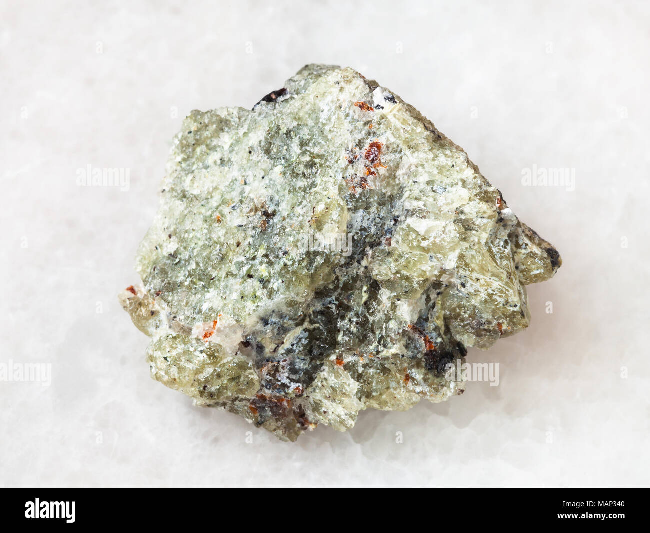 macro shooting of natural mineral rock specimen - rough olivine stone ...