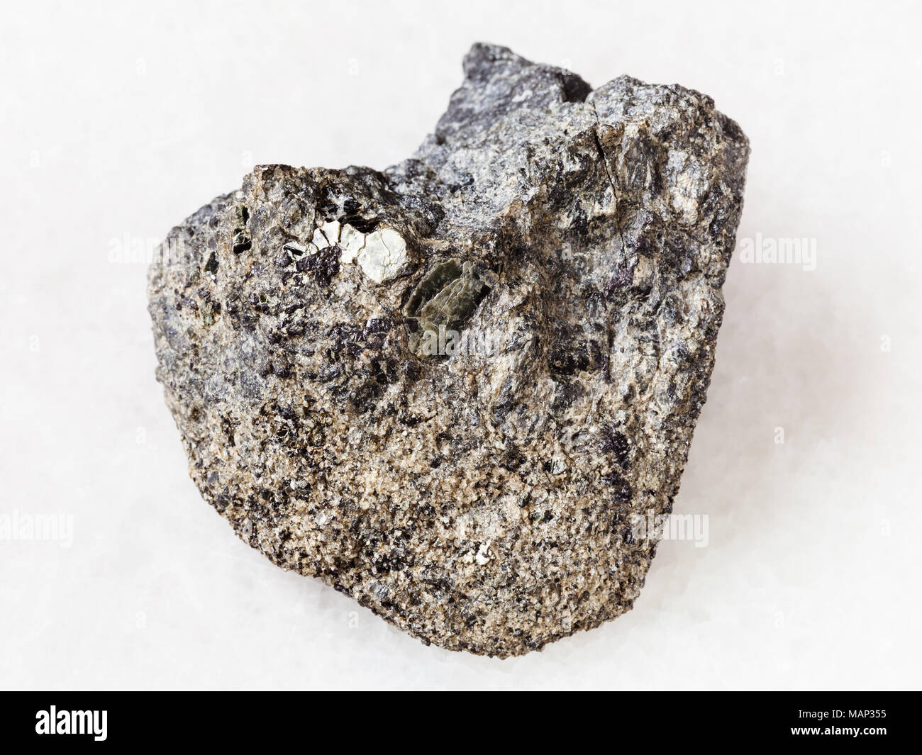 macro shooting of natural mineral rock specimen - raw peridotite stone ...