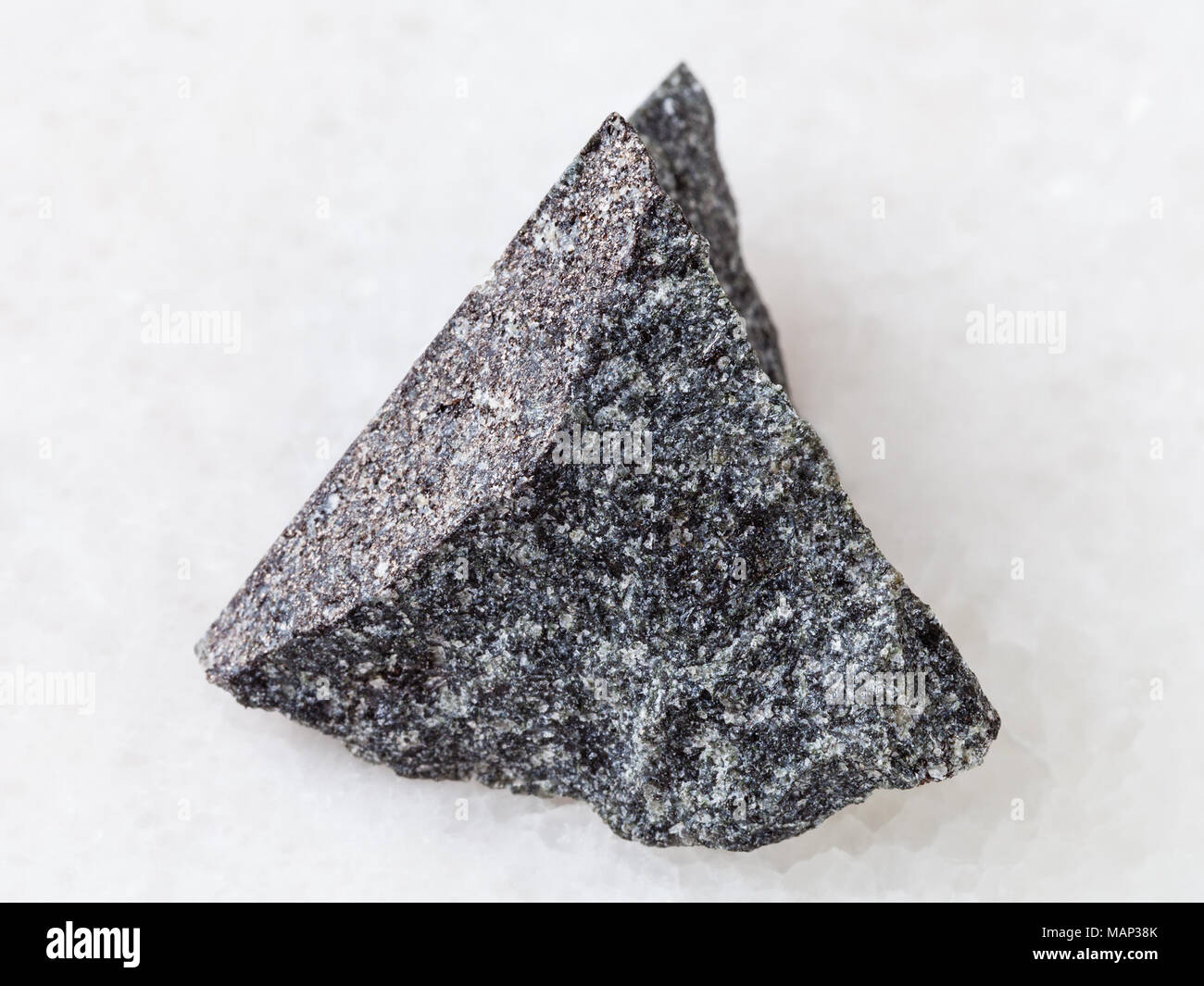 macro shooting of natural mineral rock specimen - rough olivinite stone ...