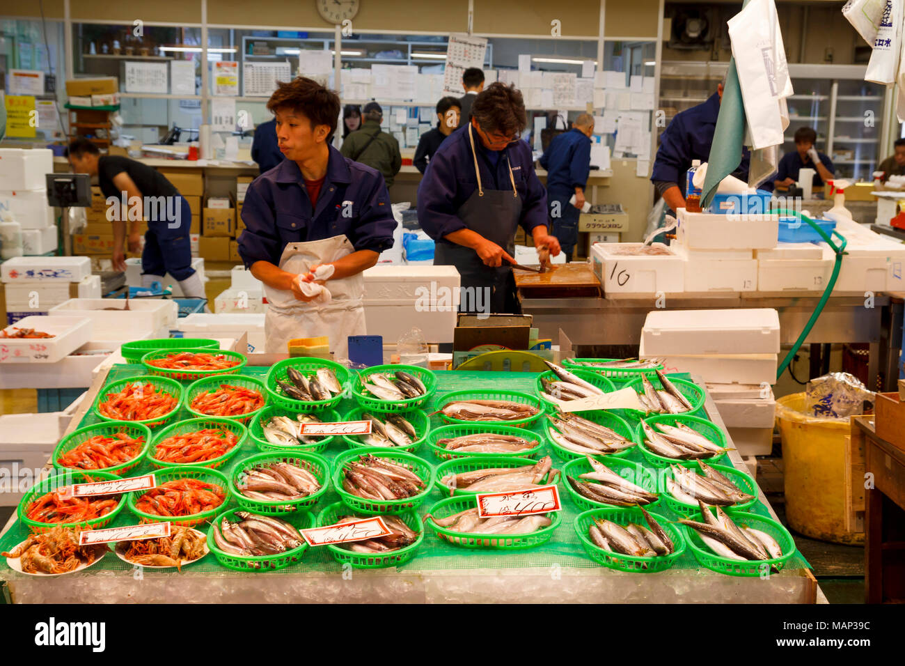 Japanese market with fresh fish and seafood on sale in the city of ...