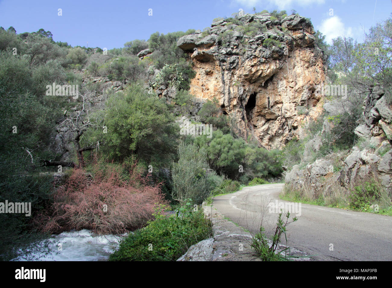 Rock Formation by a stream in Majorca, black and grey marks from water ...