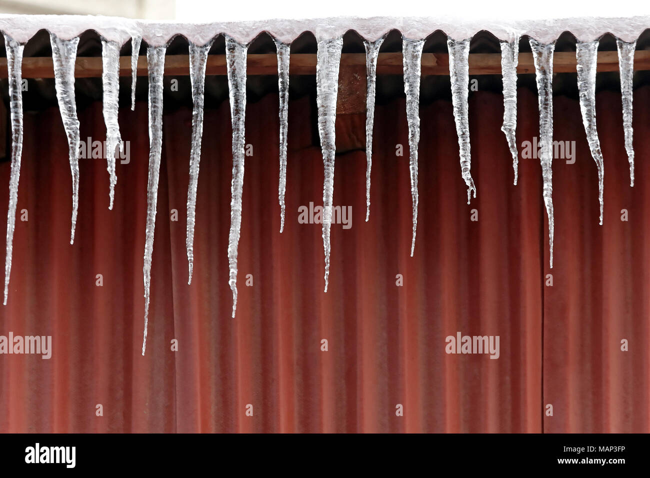 Danger Icicle Frozen Spikes of ice Formed at House Stock Photo - Alamy