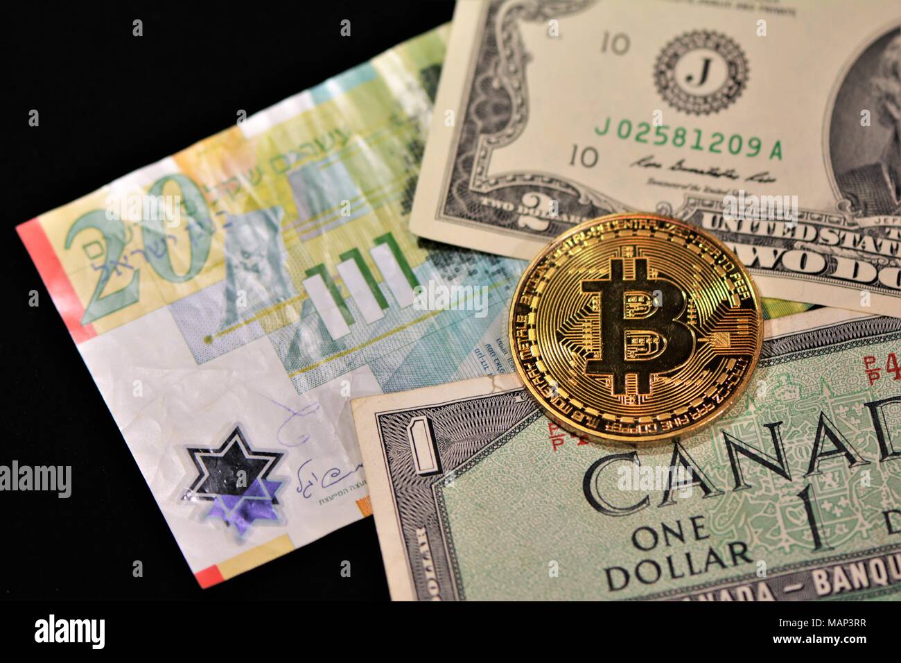 Bit coins with silver dollars and diamonds Stock Photo - Alamy