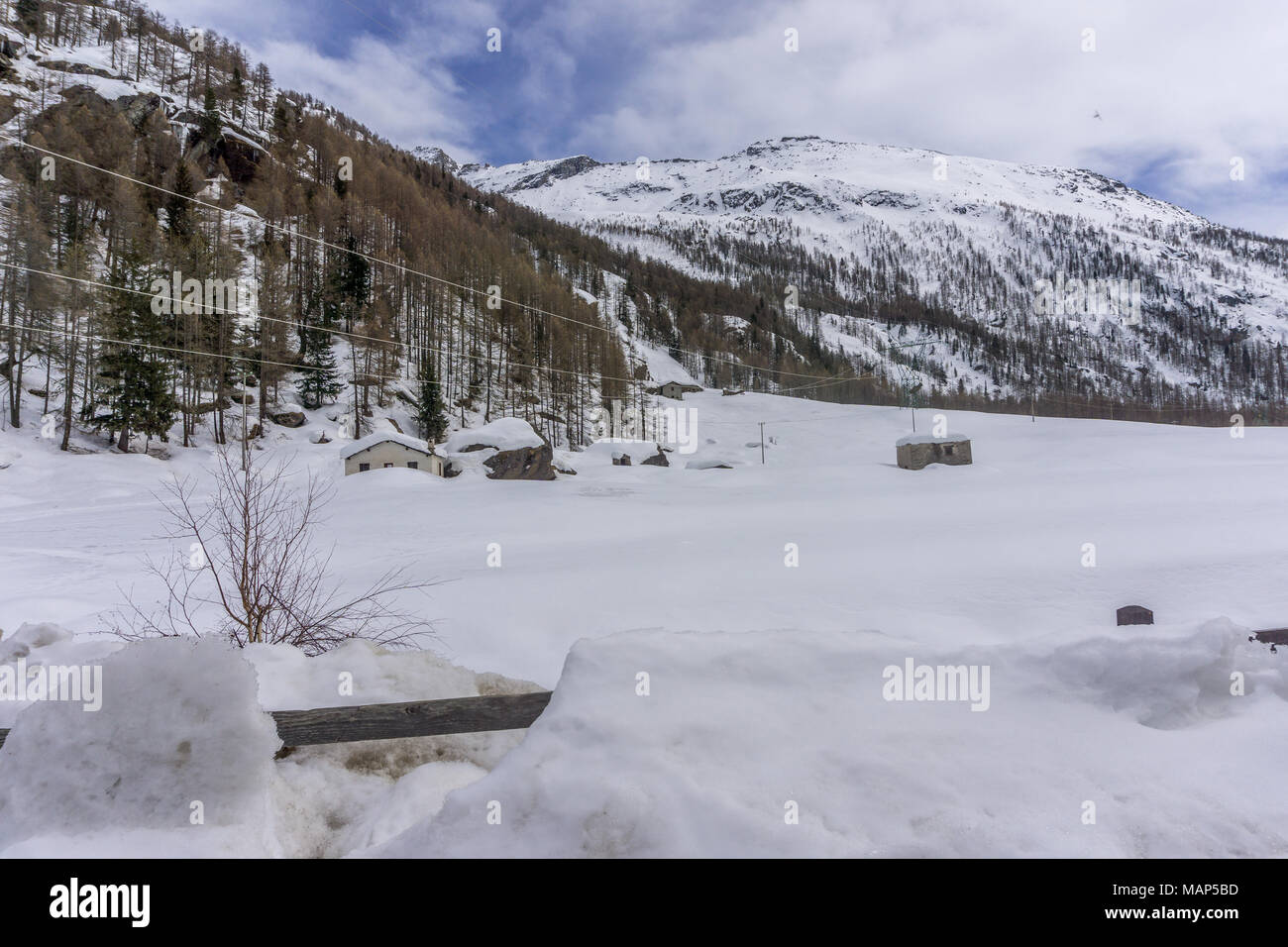spring in the mountains with lots of snow Stock Photo - Alamy