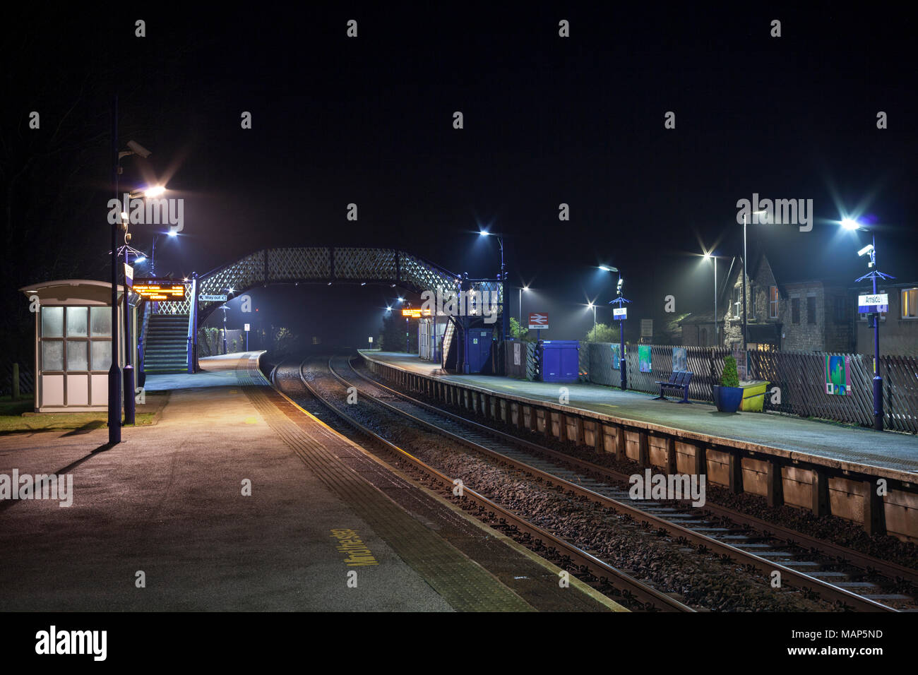 Arnside railway station at night in the dark , on the Cumbrian coast ...
