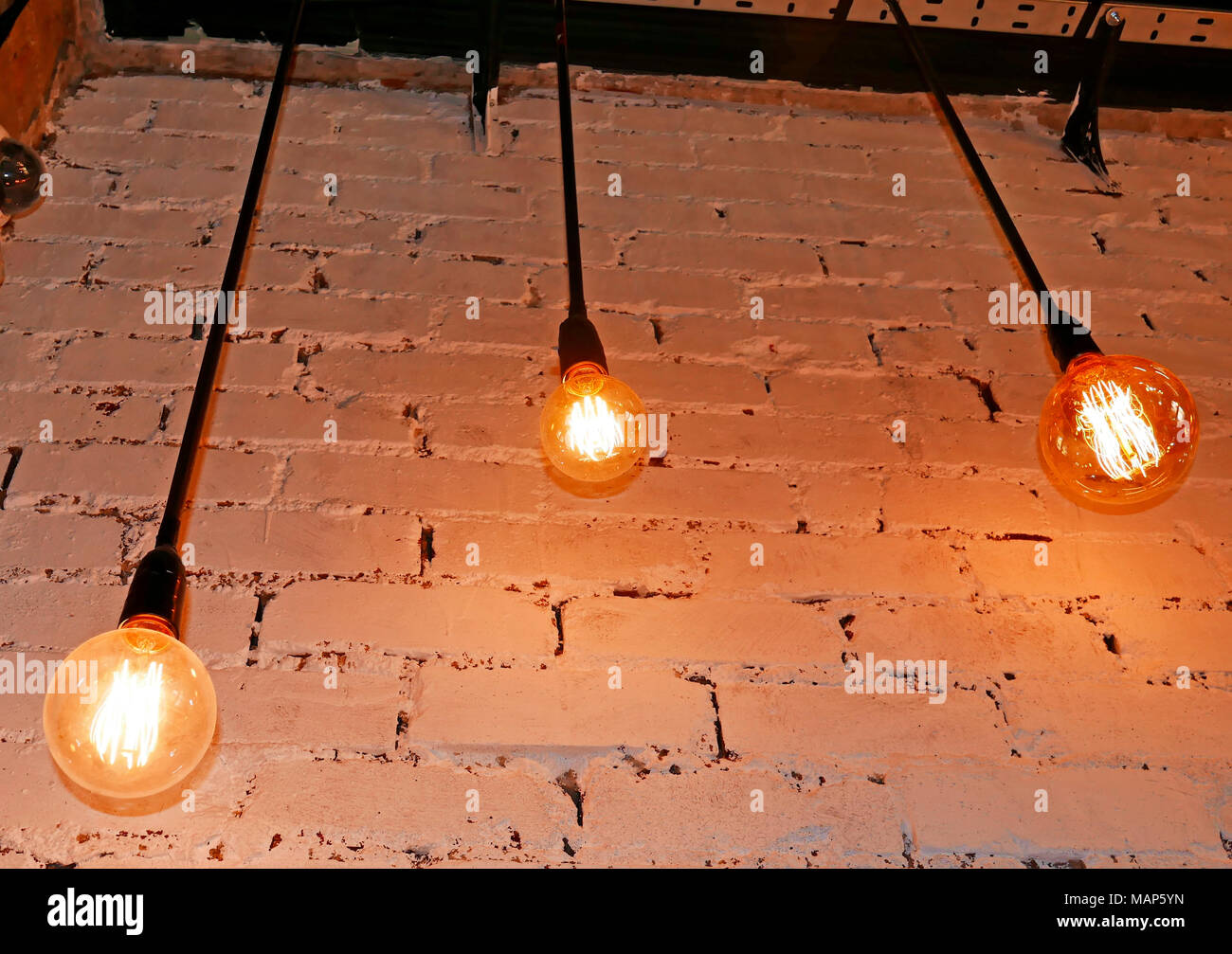 Hanging from ceiling hi-res stock photography and images - Alamy