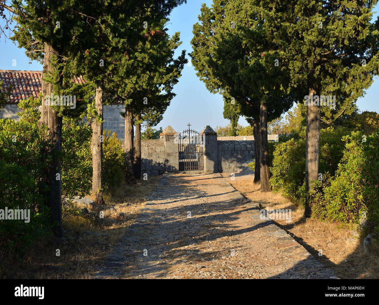 Entrance gate church path hi-res stock photography and images - Alamy