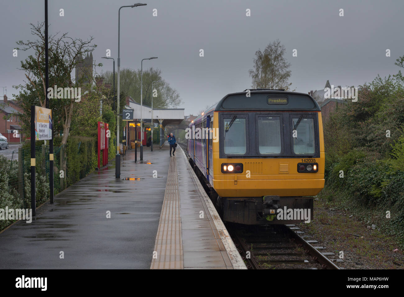 An Arriva Northern rail class 142 pacer train 142035 at a wet Ormskirk ...
