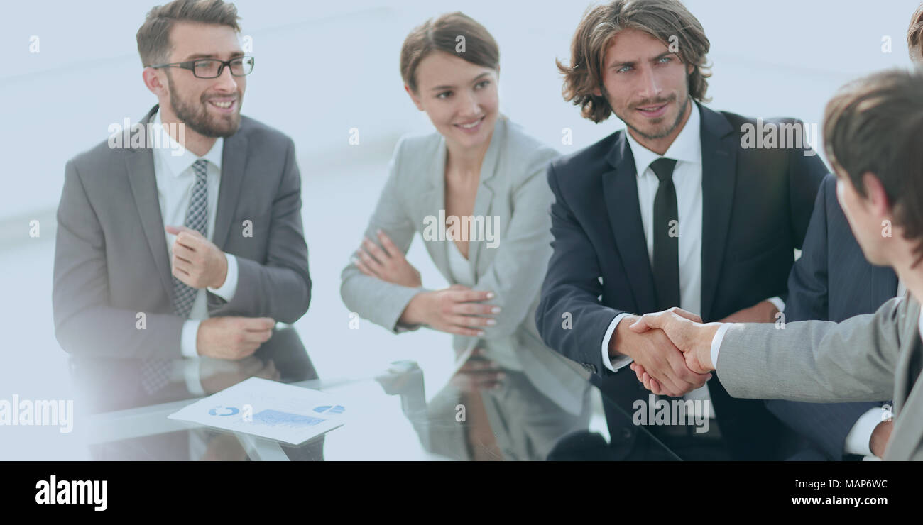 handshake partners at a business meeting Stock Photo - Alamy