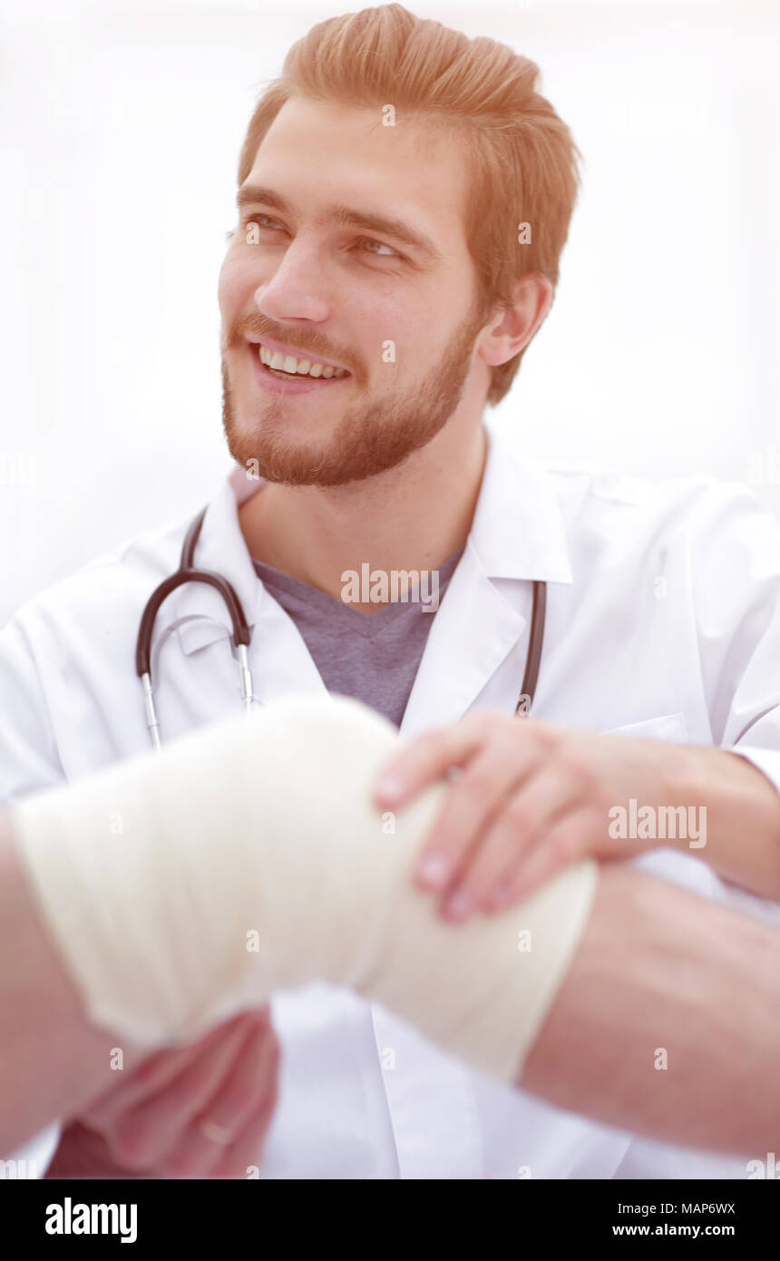 Doctor examining injured foot sport injury hi-res stock photography and ...