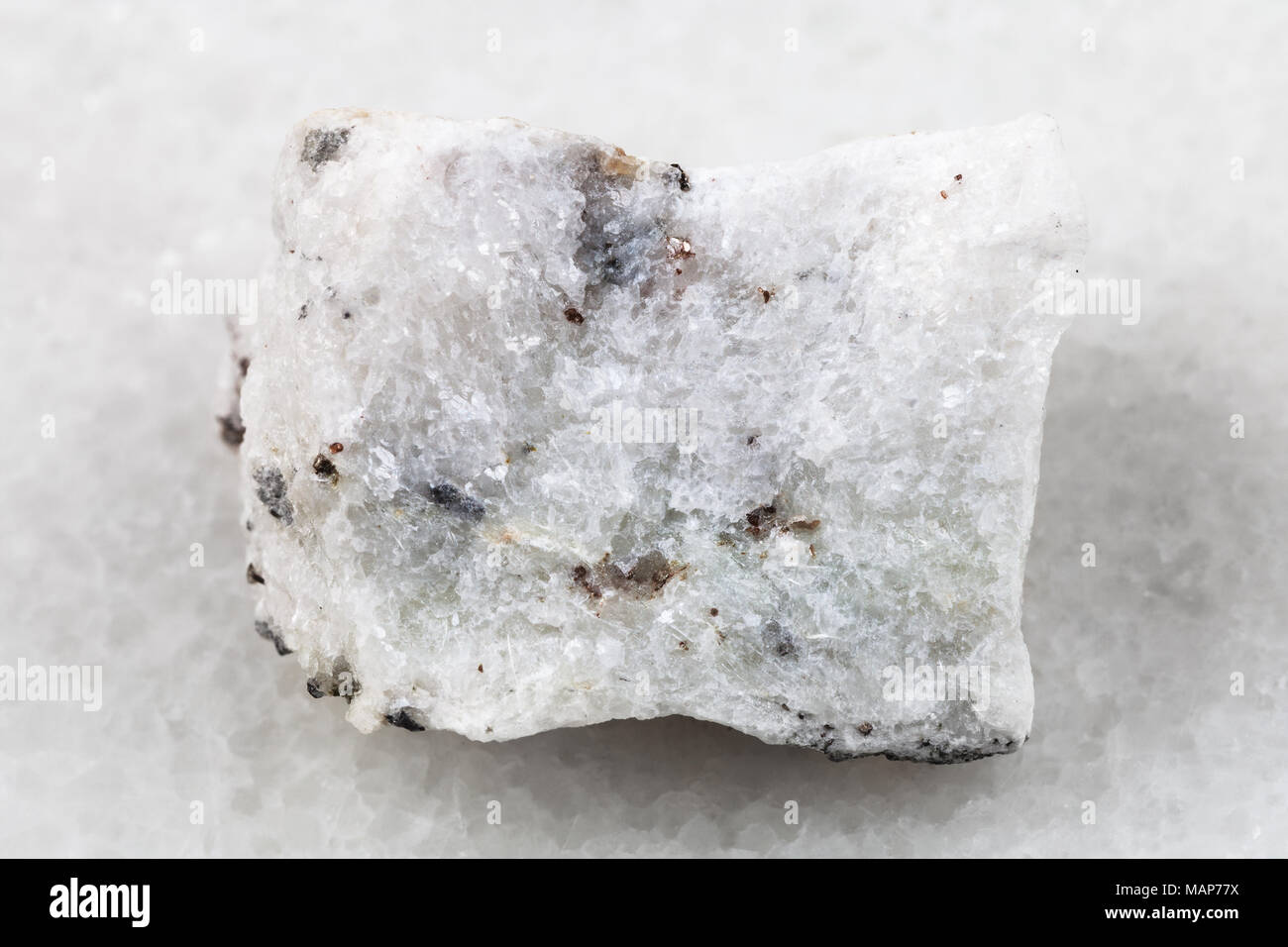 macro shooting of natural mineral rock specimen - raw carbonatite stone ...