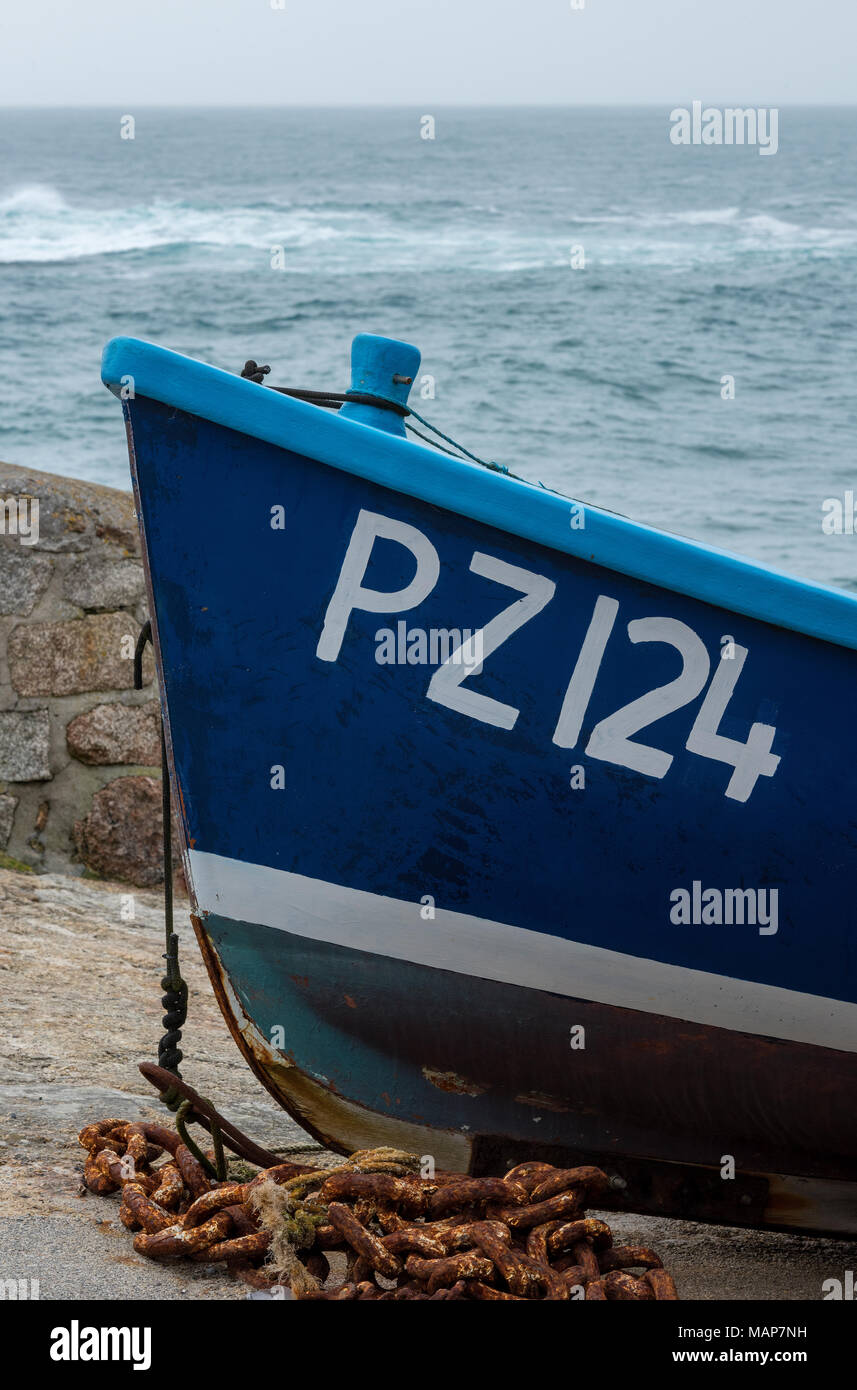 a small open cornish fishing boat painted blue on a slipway at sennen ...