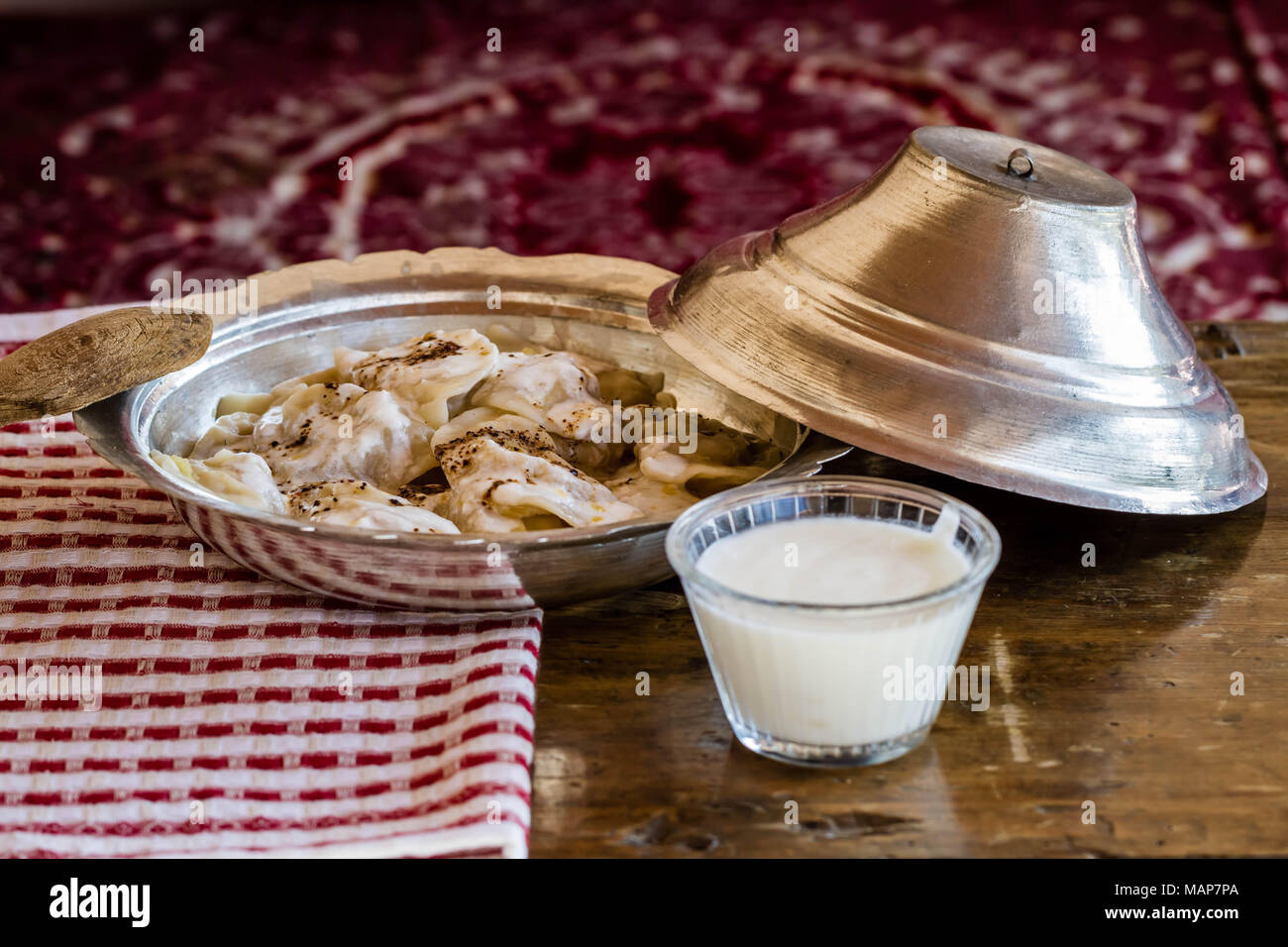 Traditional Circassian ravioli made with potatoes on traditional plate ...