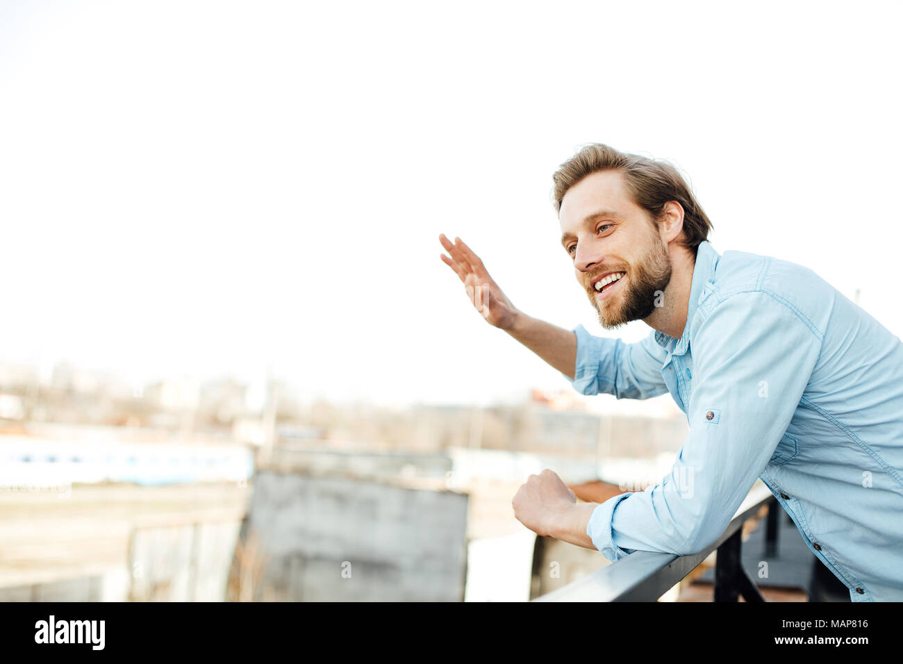 Men standing face face waving hi-res stock photography and images - Alamy