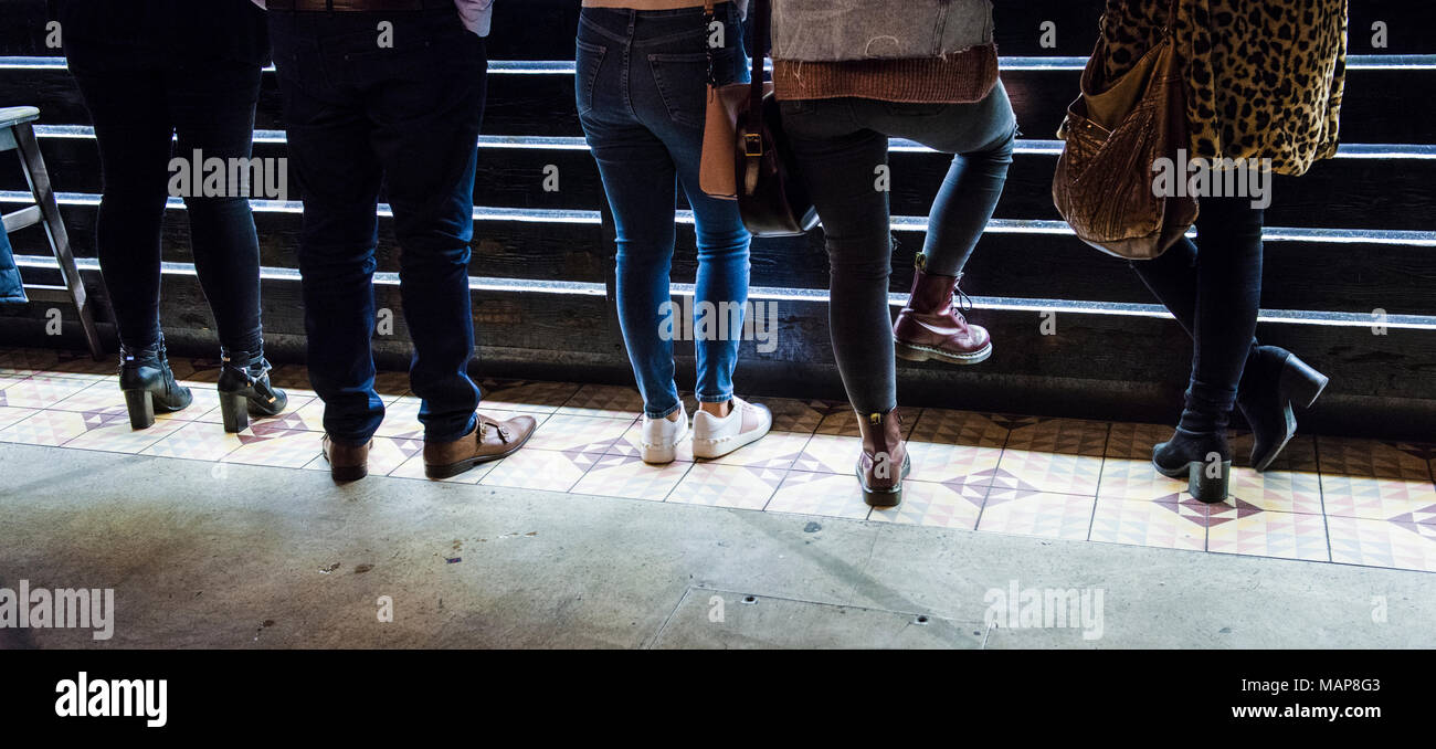 Five people standing at bar, The Foundry, Harrogate, England, UK Stock ...