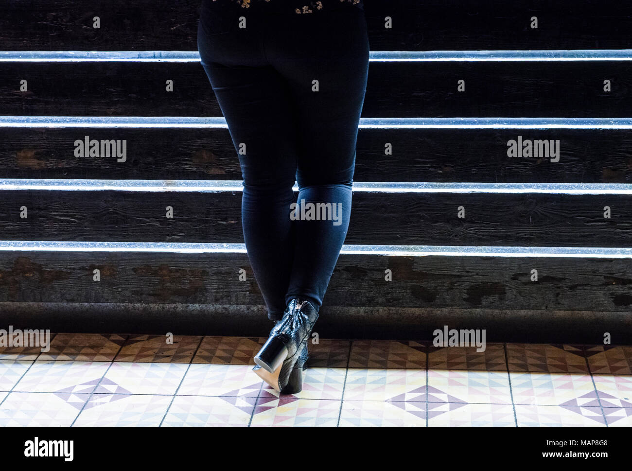 Person standing on floor hi-res stock photography and images - Alamy