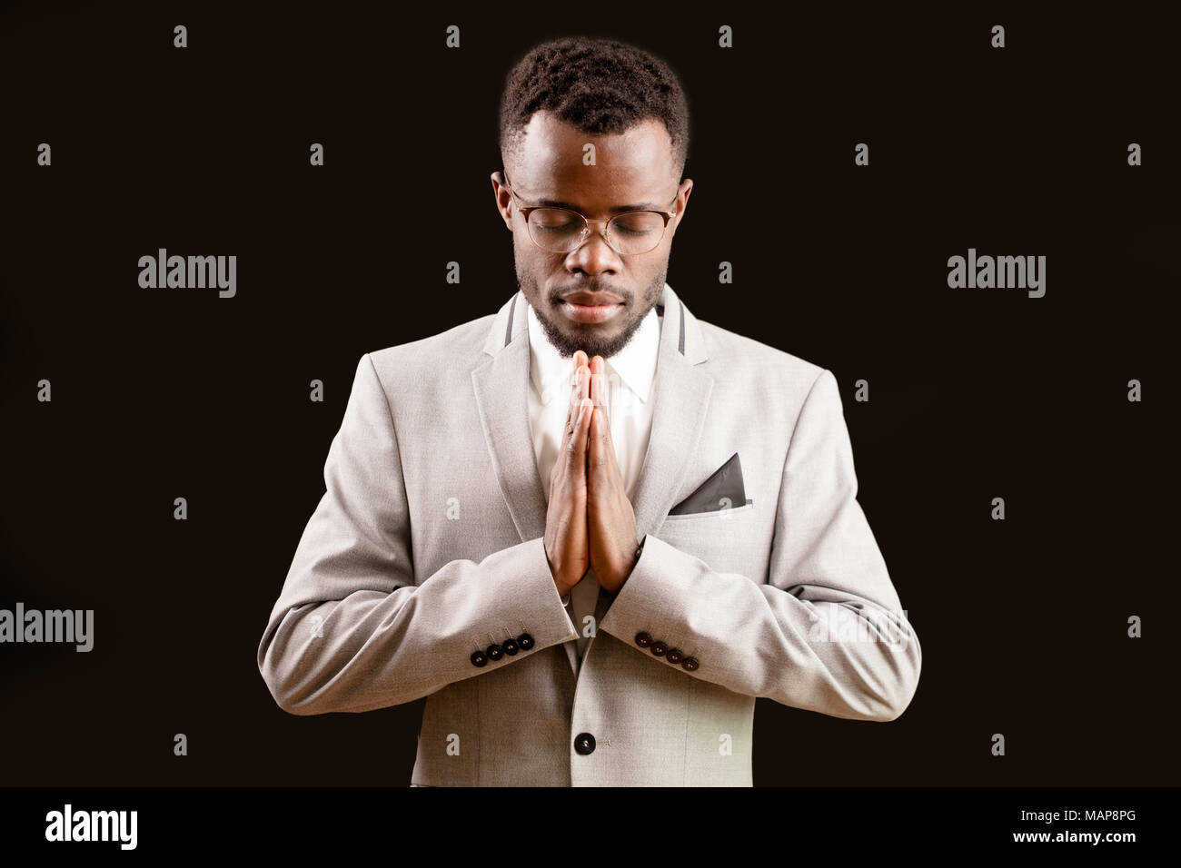 Buddhist man in white suit meditating . concept of religion.. praying ...