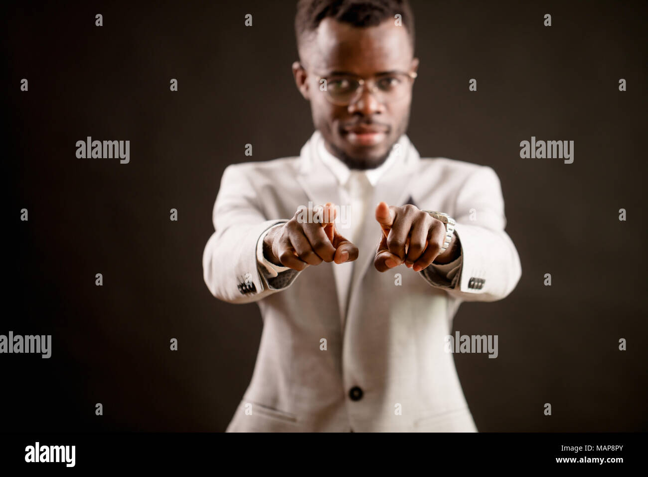 pointing fingers of African model. concept of choise Stock Photo - Alamy