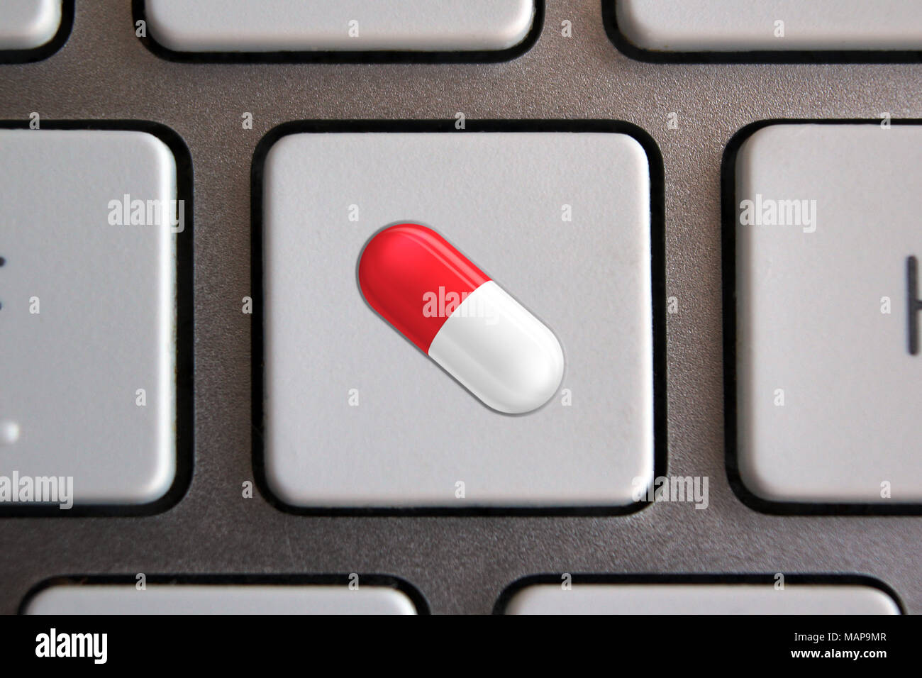 Close-up of button with medicine drug capsule pill icon as symbol Stock ...