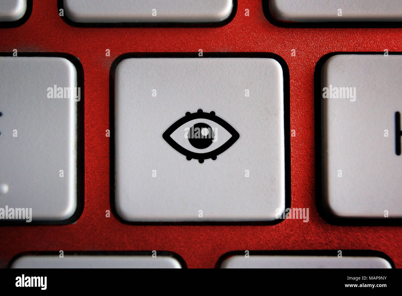 Image of eye icon on computer keyboard button Stock Photo - Alamy