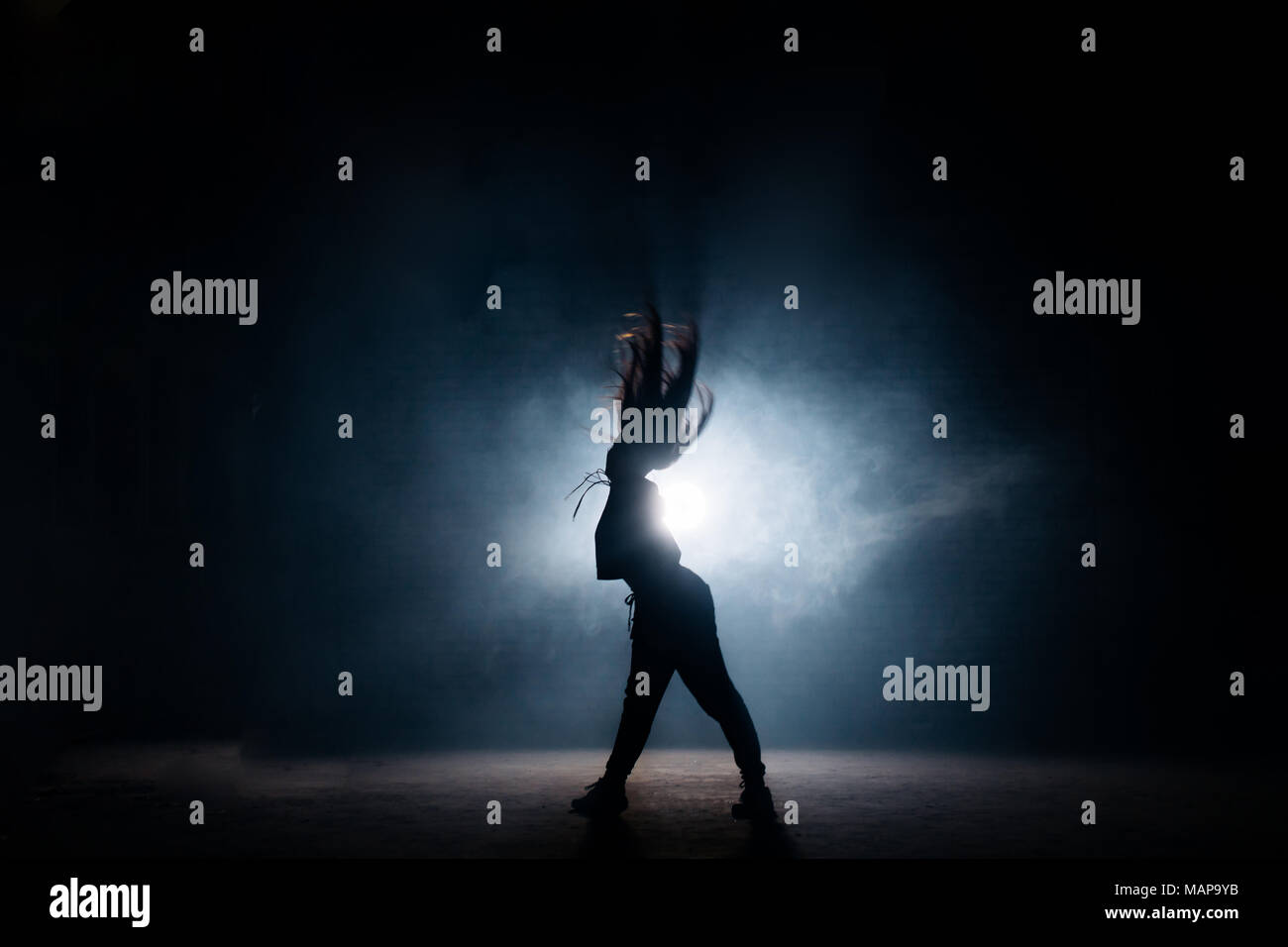 young woman dancing at night club on bright stage Stock Photo - Alamy