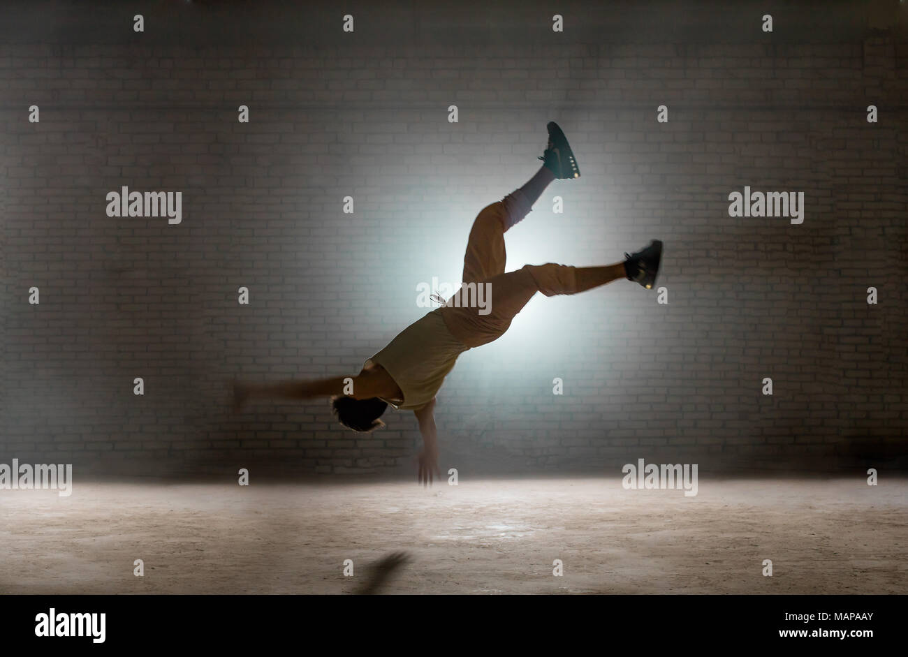 young Caucasian man falling down after daredevil stunt Stock Photo - Alamy