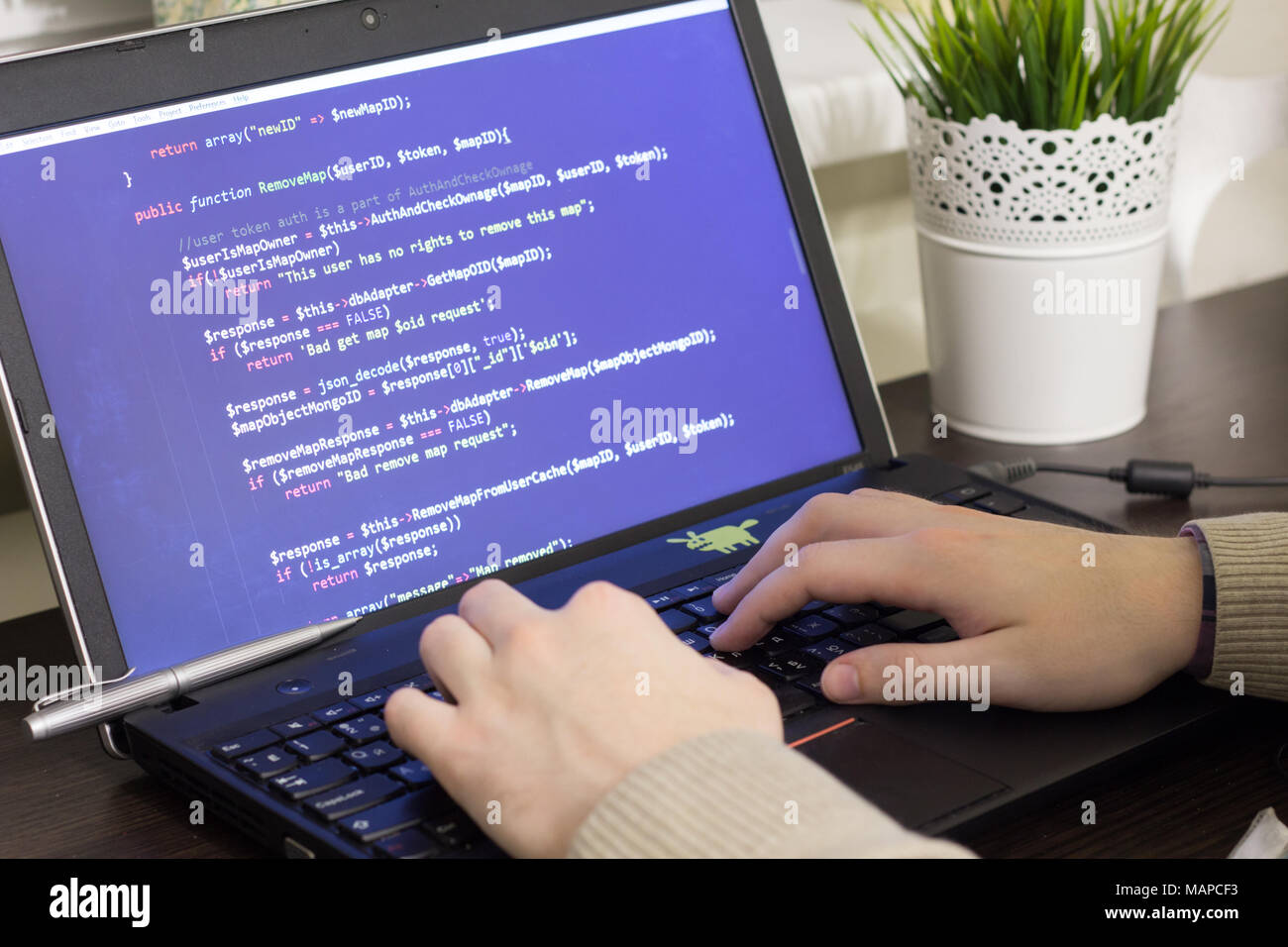Web developer typing a PHP program on keyboard. Digital technology modern background Stock Photo ...