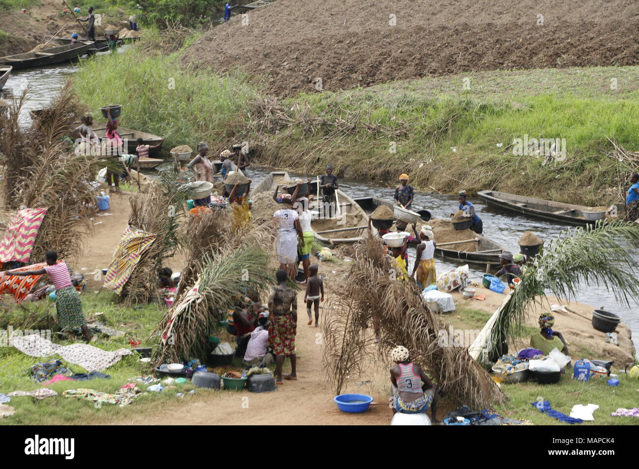 People digging sand in the river for constructions for houses Stock ...