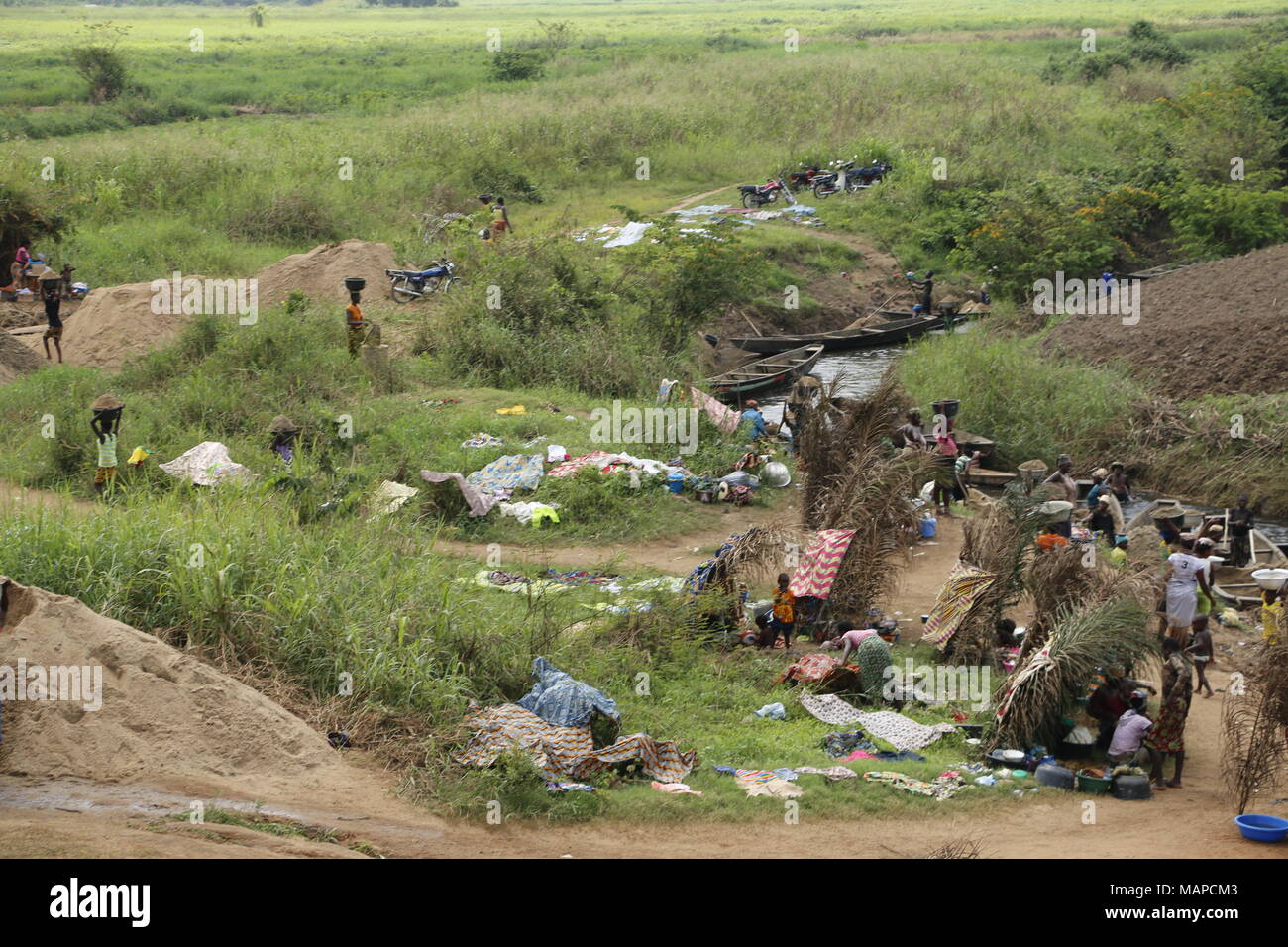 People digging sand in the river for constructions for houses Stock ...