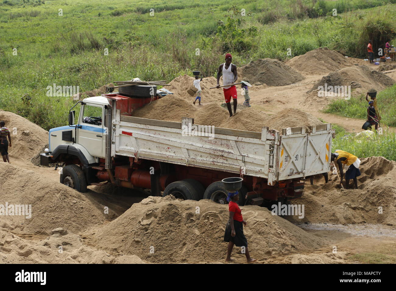 People digging sand in the river for constructions for houses Stock ...