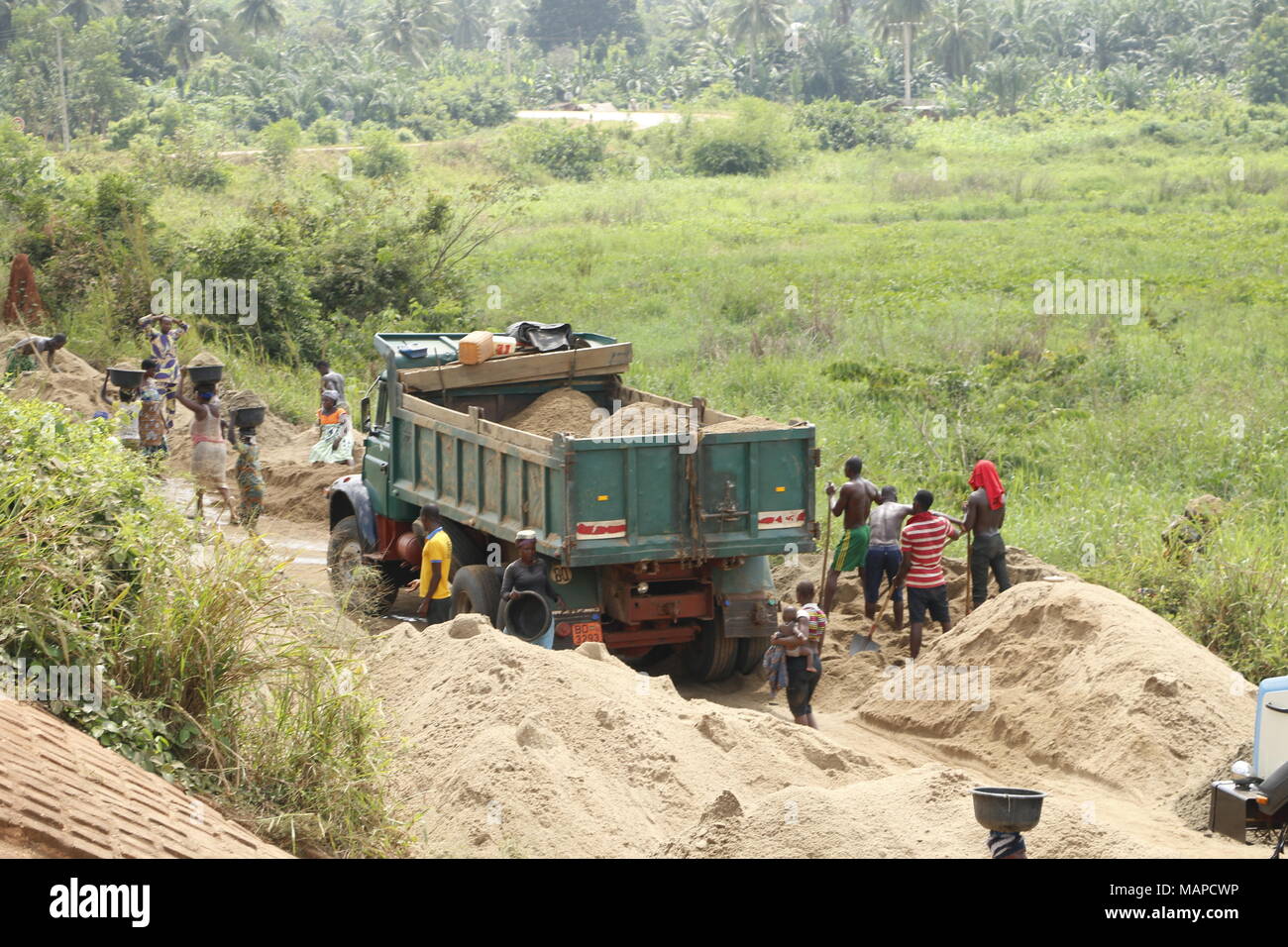 People digging sand in the river for constructions for houses Stock ...