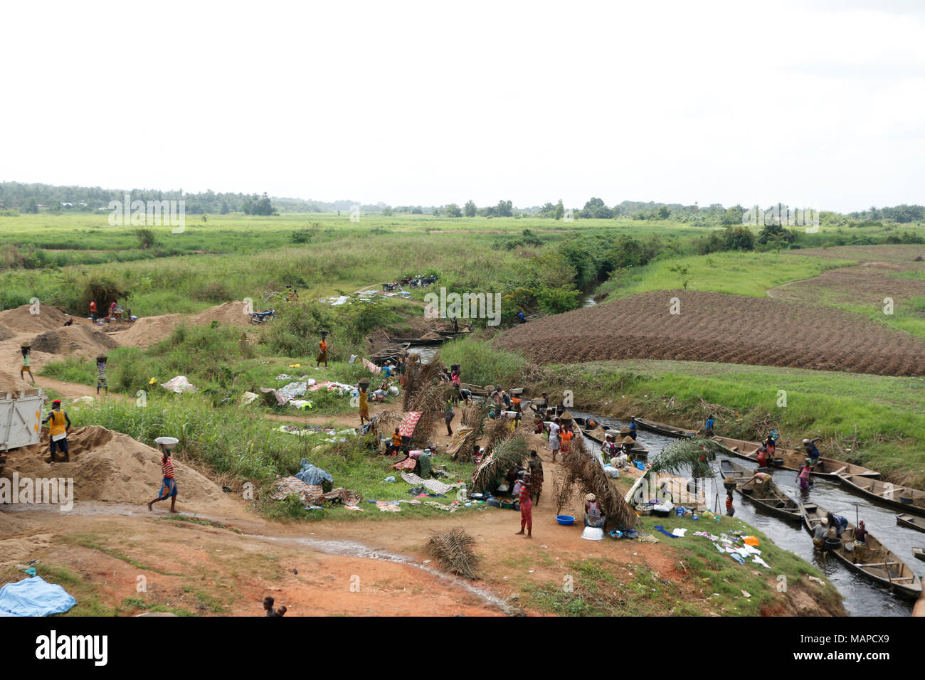 People digging sand in the river for constructions for houses Stock ...