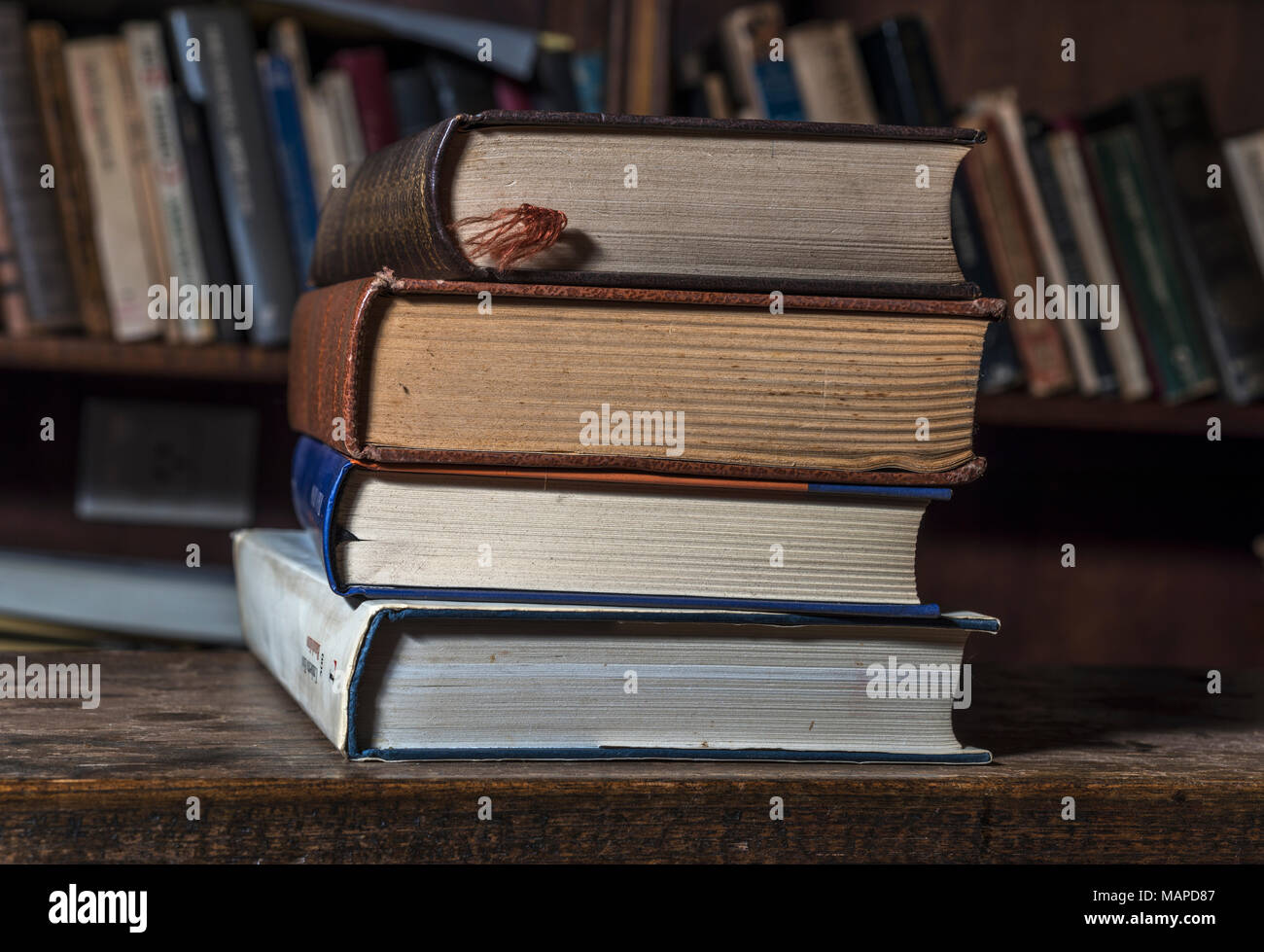 Old books spine table hi-res stock photography and images - Alamy